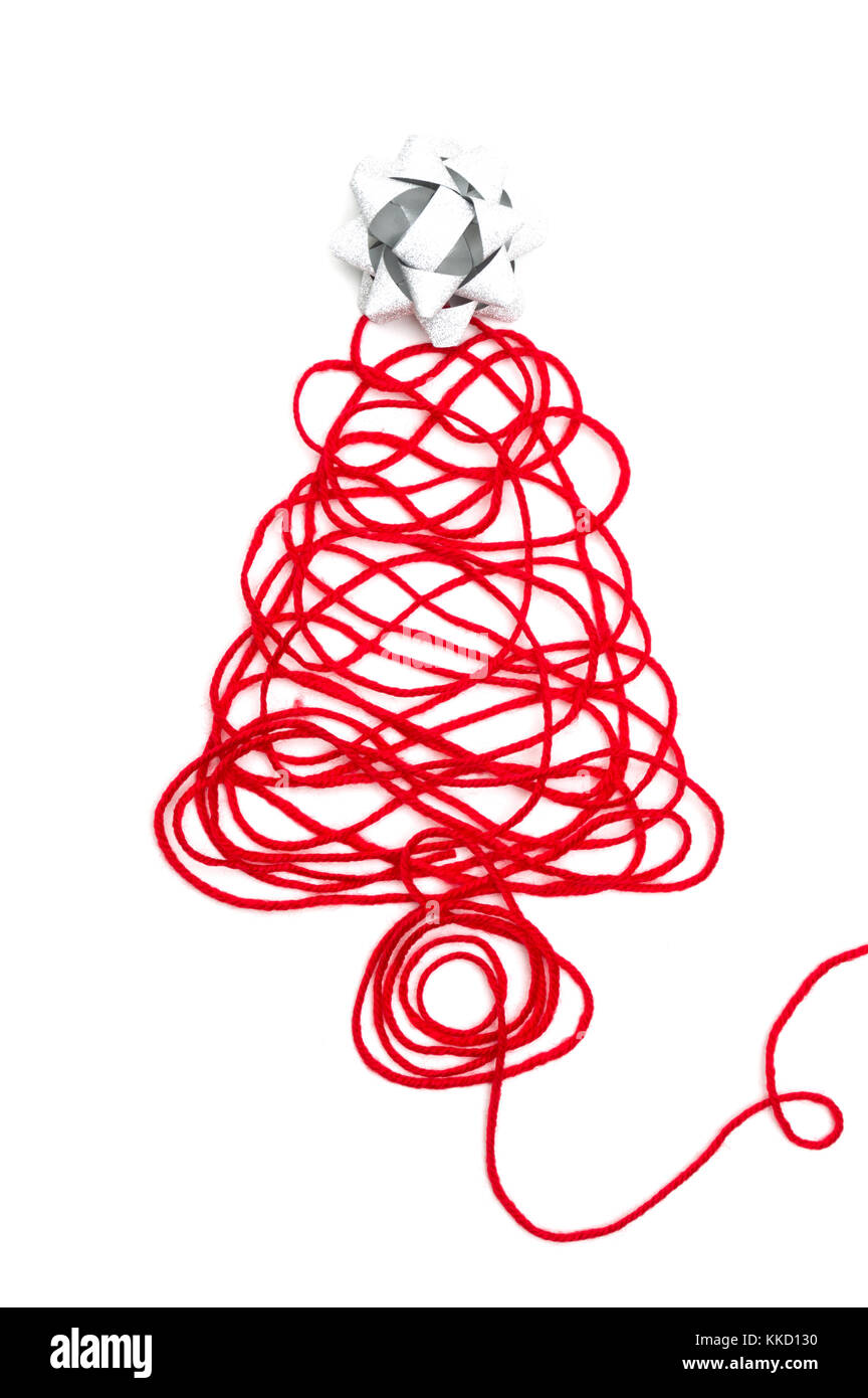 A tree made of red thread and ribbon on white background Stock Photo ...