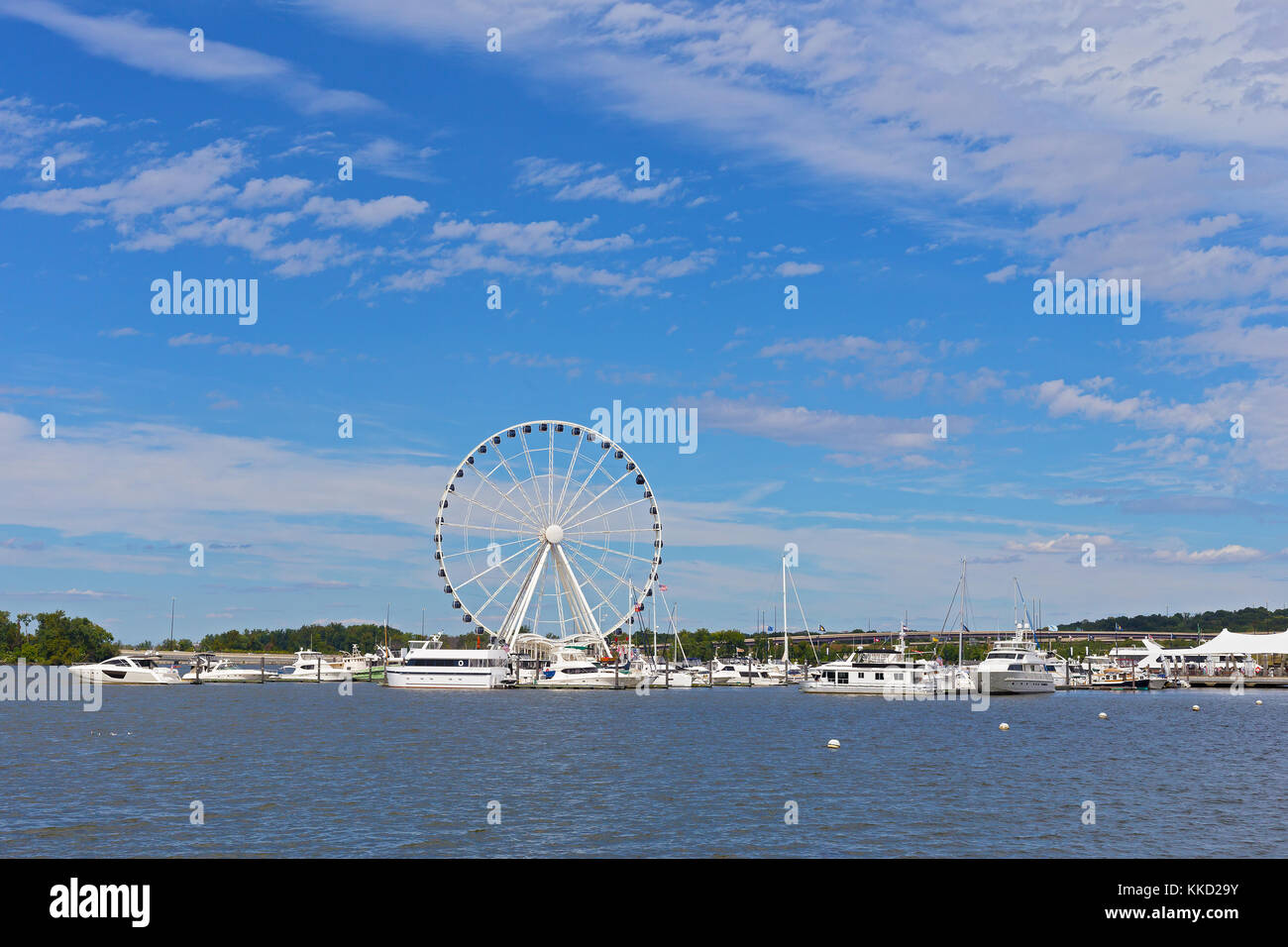Panorama of National Harbor with Ferris and yachts at pier in Maryland ...