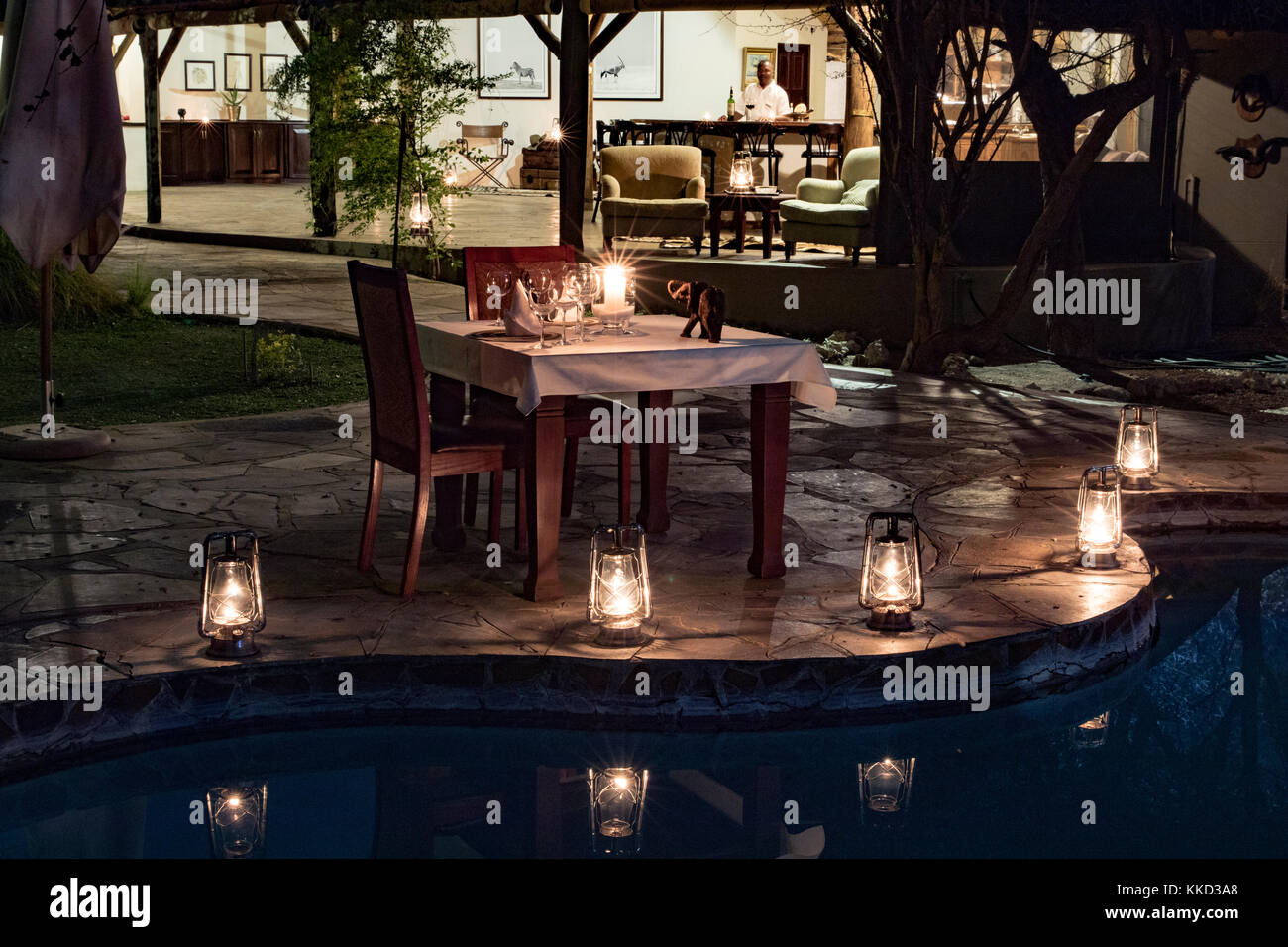 Poolside dining at night - Etosha Aoba Lodge, Onguma Game Reserve ...