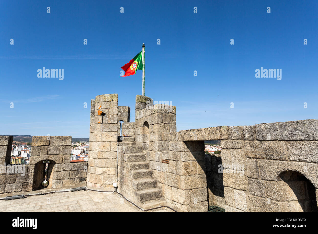 The cylindrical watchtower, merlons and arrow slits on top of the ...