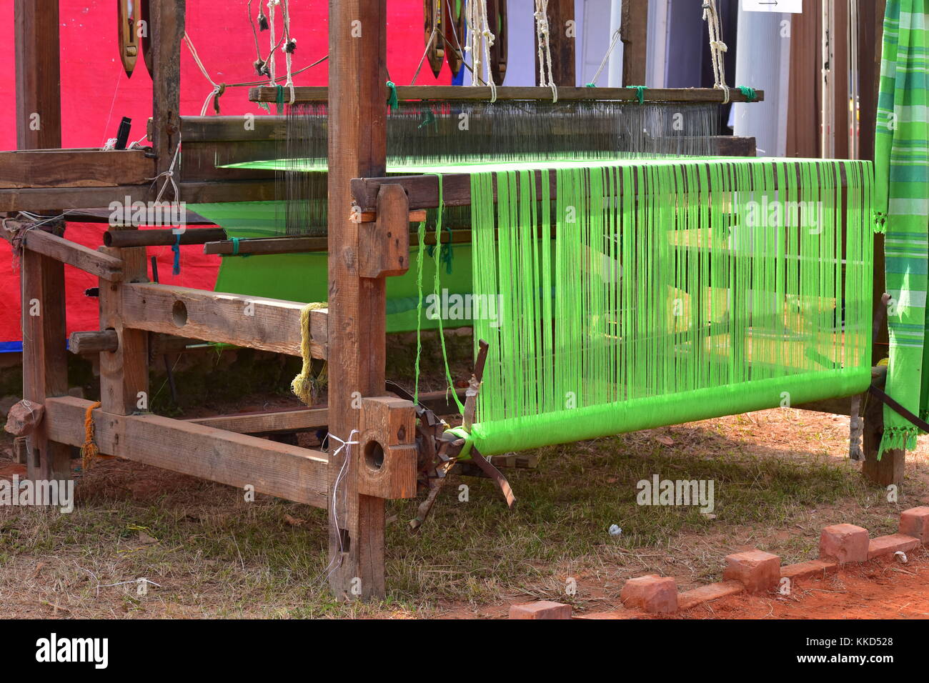 A hand loom made of wood traditionally used to weave cotton fabric ...