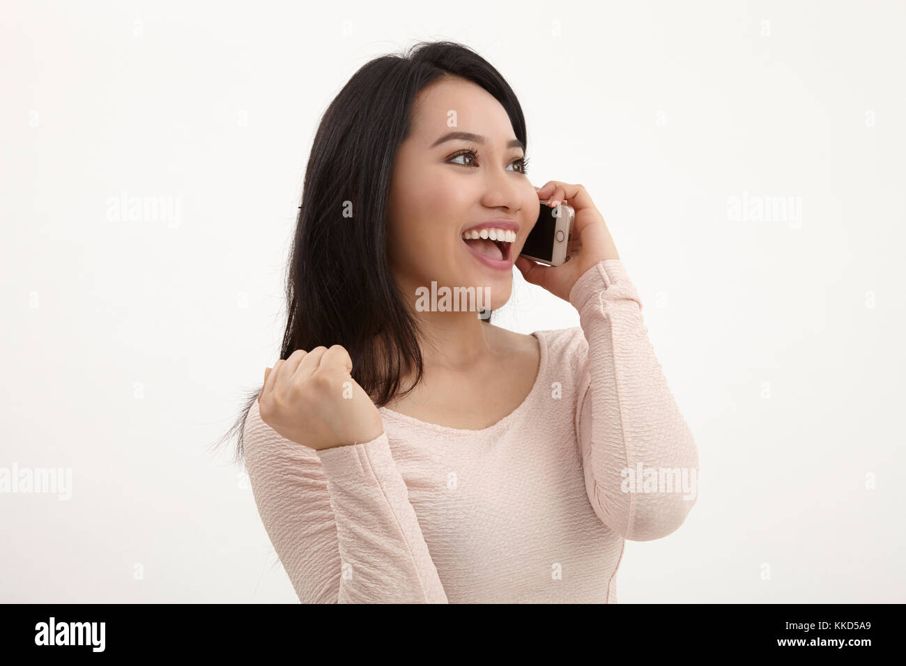 malay woman talking using mobile phone Stock Photo - Alamy