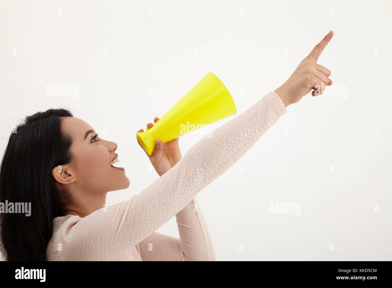 malay woman using megaphone on the white background Stock Photo - Alamy