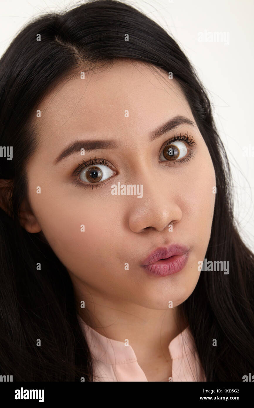 close up of curious woman with a wide open eyes Stock Photo - Alamy