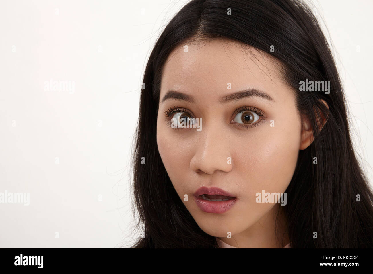 close up of curious woman with a wide open eyes Stock Photo - Alamy