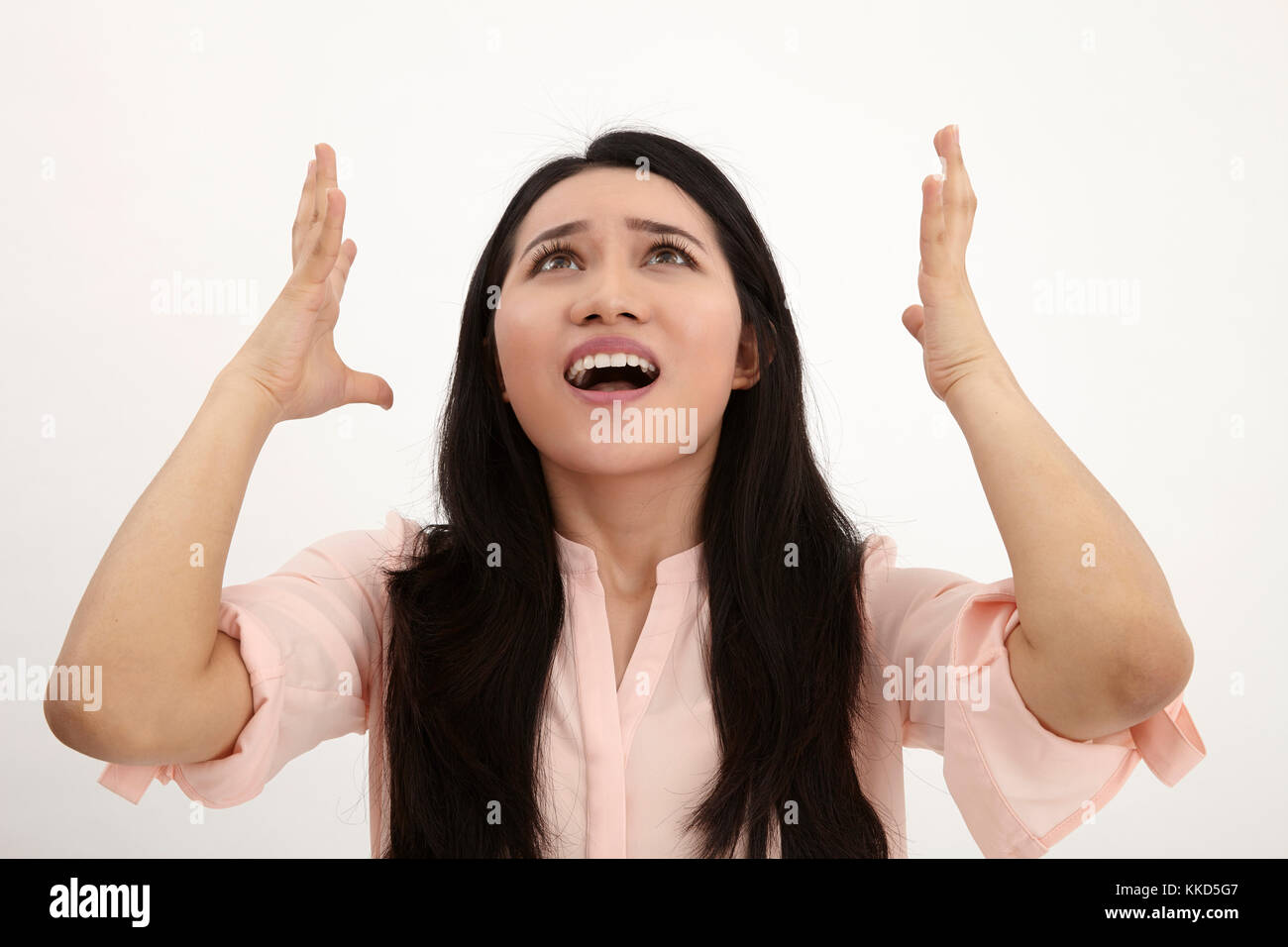 malaay woman with surprised expression on the white background Stock ...