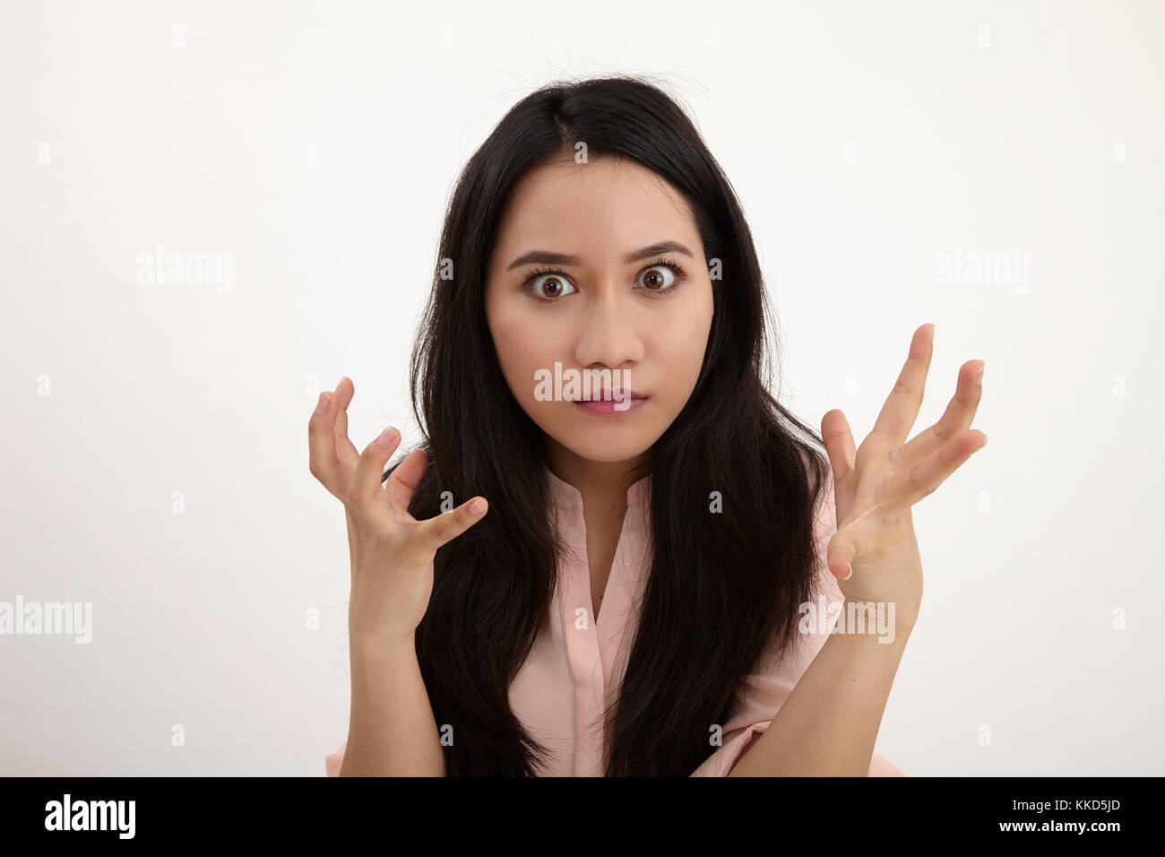 angry malay woman with both hand open Stock Photo - Alamy