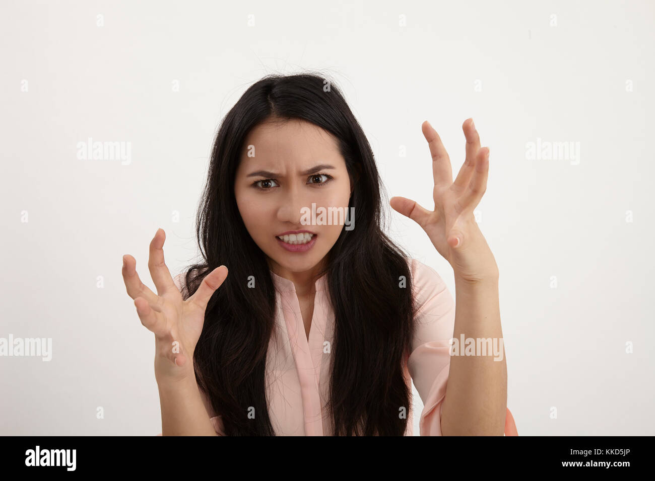 angry malay woman with both hand open Stock Photo - Alamy