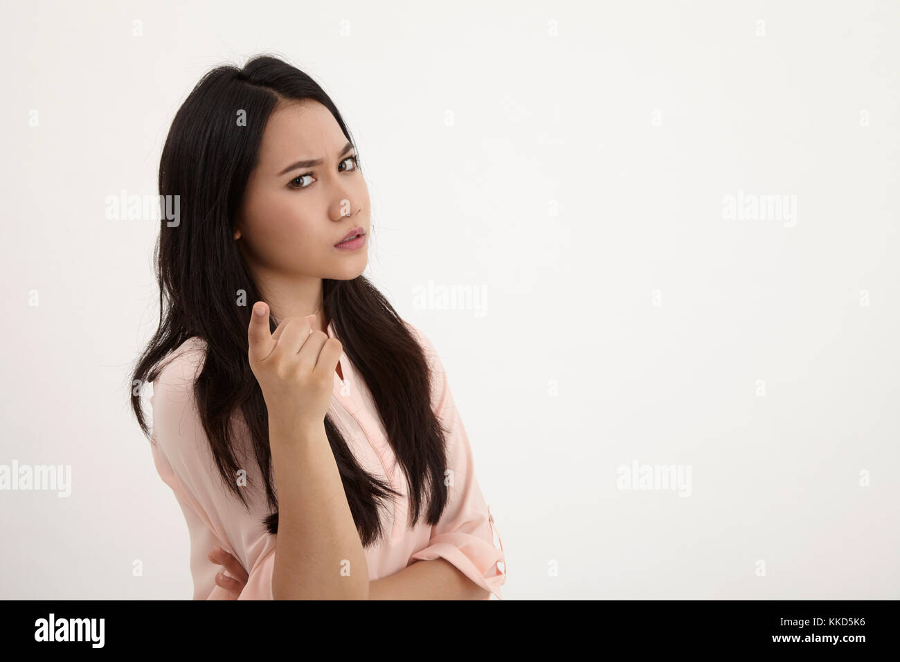side view of a angry malay woman Stock Photo - Alamy