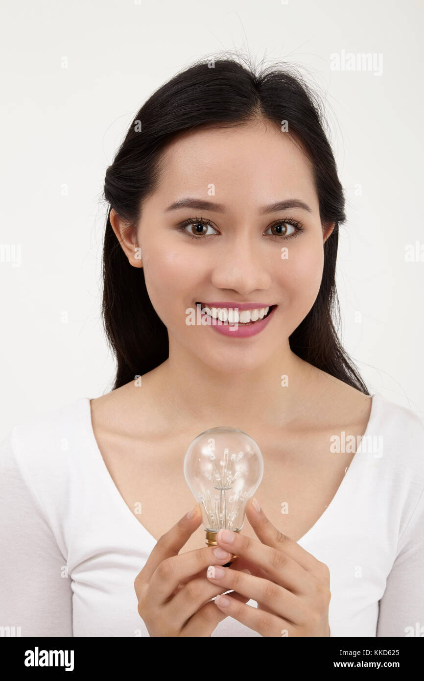 Businesswoman eco friendly bulb hi-res stock photography and images - Alamy