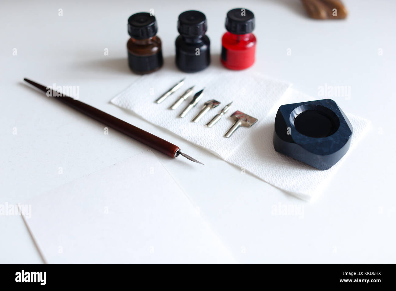 Photo of accessories for calligraphy and lettering on white tabl Stock ...
