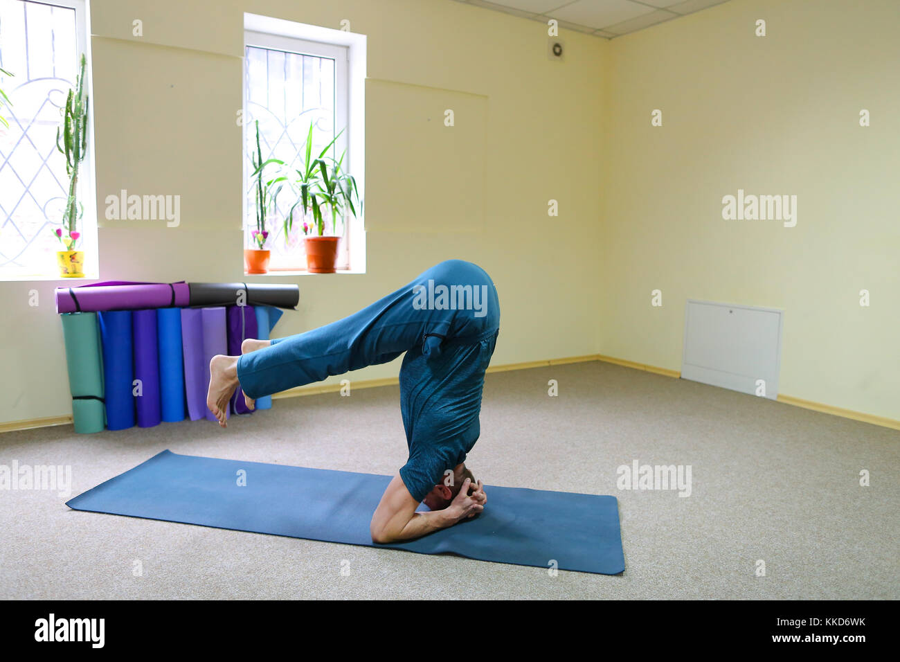 Beautiful young American performs asanas from yoga Stock Photo - Alamy