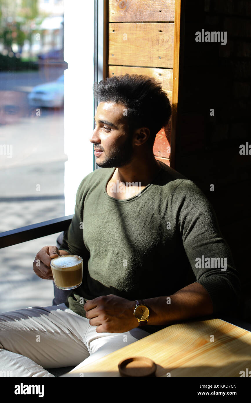 Journalist drinking coffee in lunch time, slow motion Stock Photo - Alamy