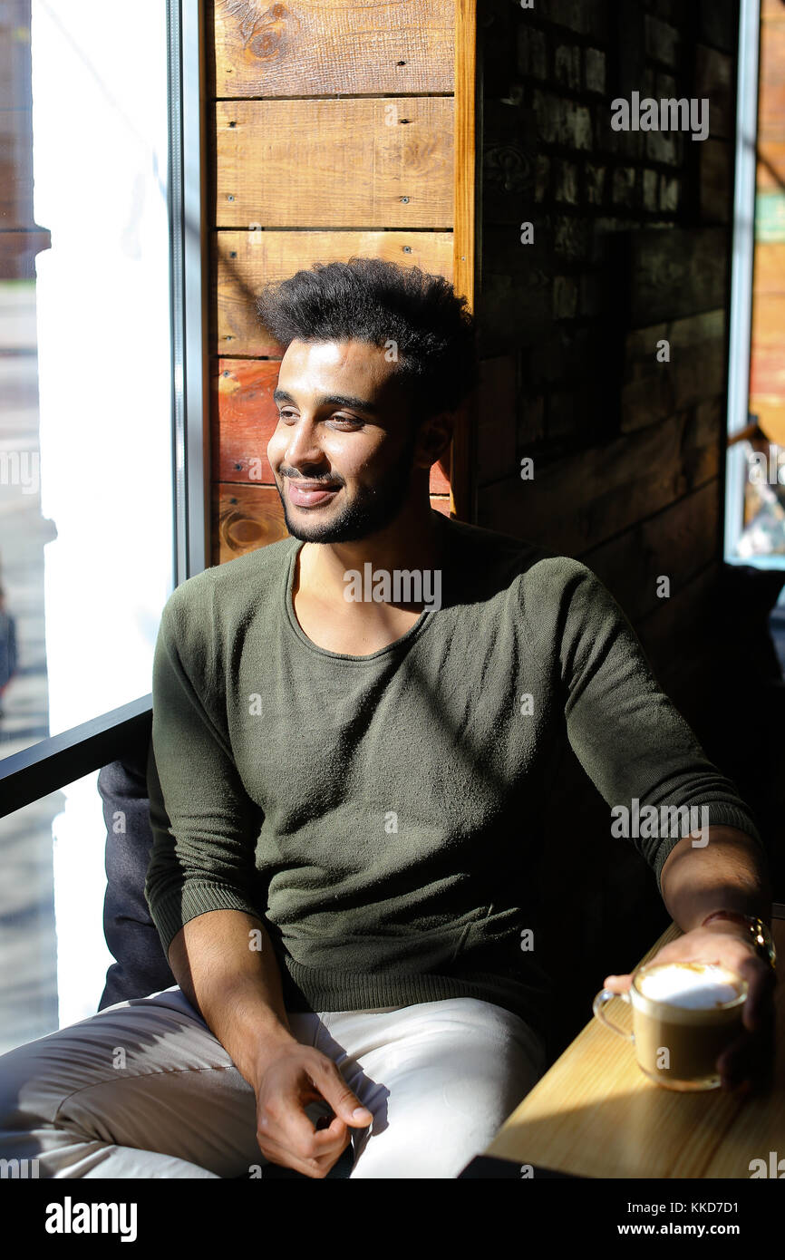 Journalist drinking coffee in lunch time, slow motion Stock Photo - Alamy