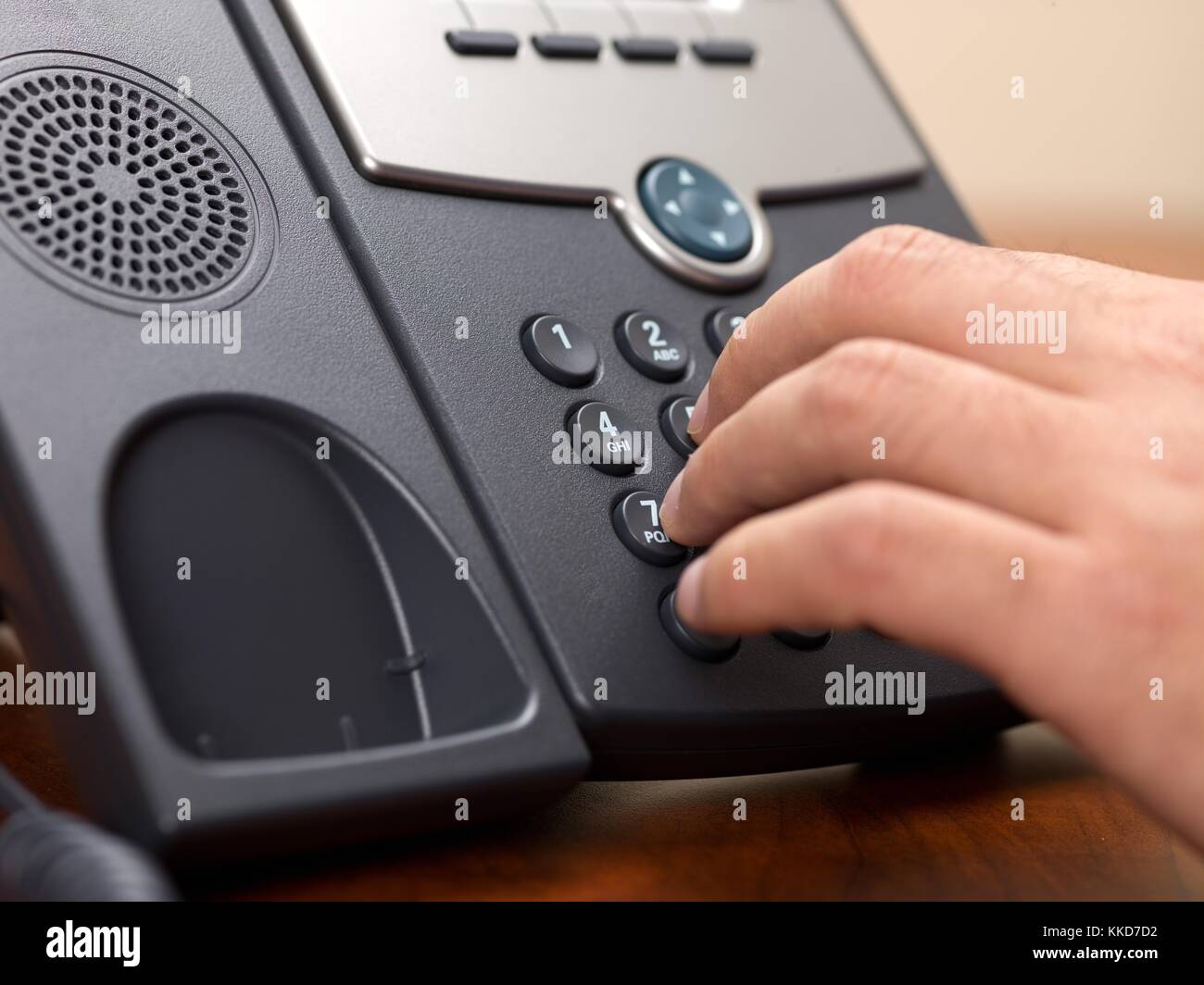 close up shot of a person dialing from a landline phone Stock Photo - Alamy