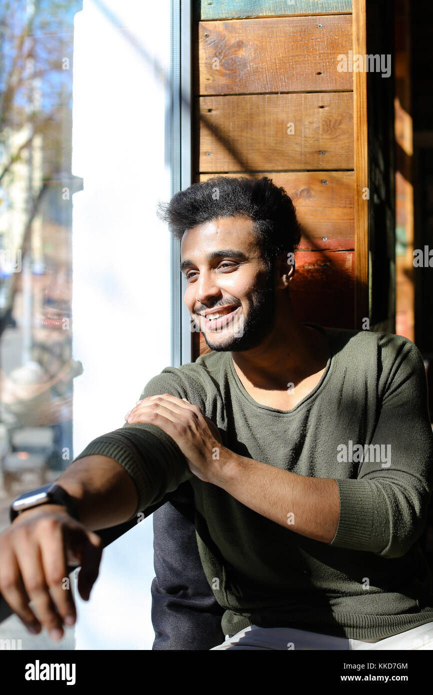 Young bodybuilder wasting time after training Stock Photo - Alamy