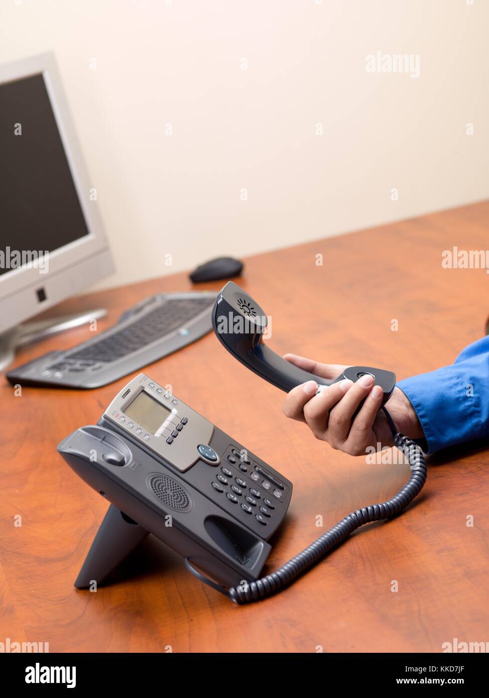 human hand holding landline phone receiver in hand Stock Photo - Alamy