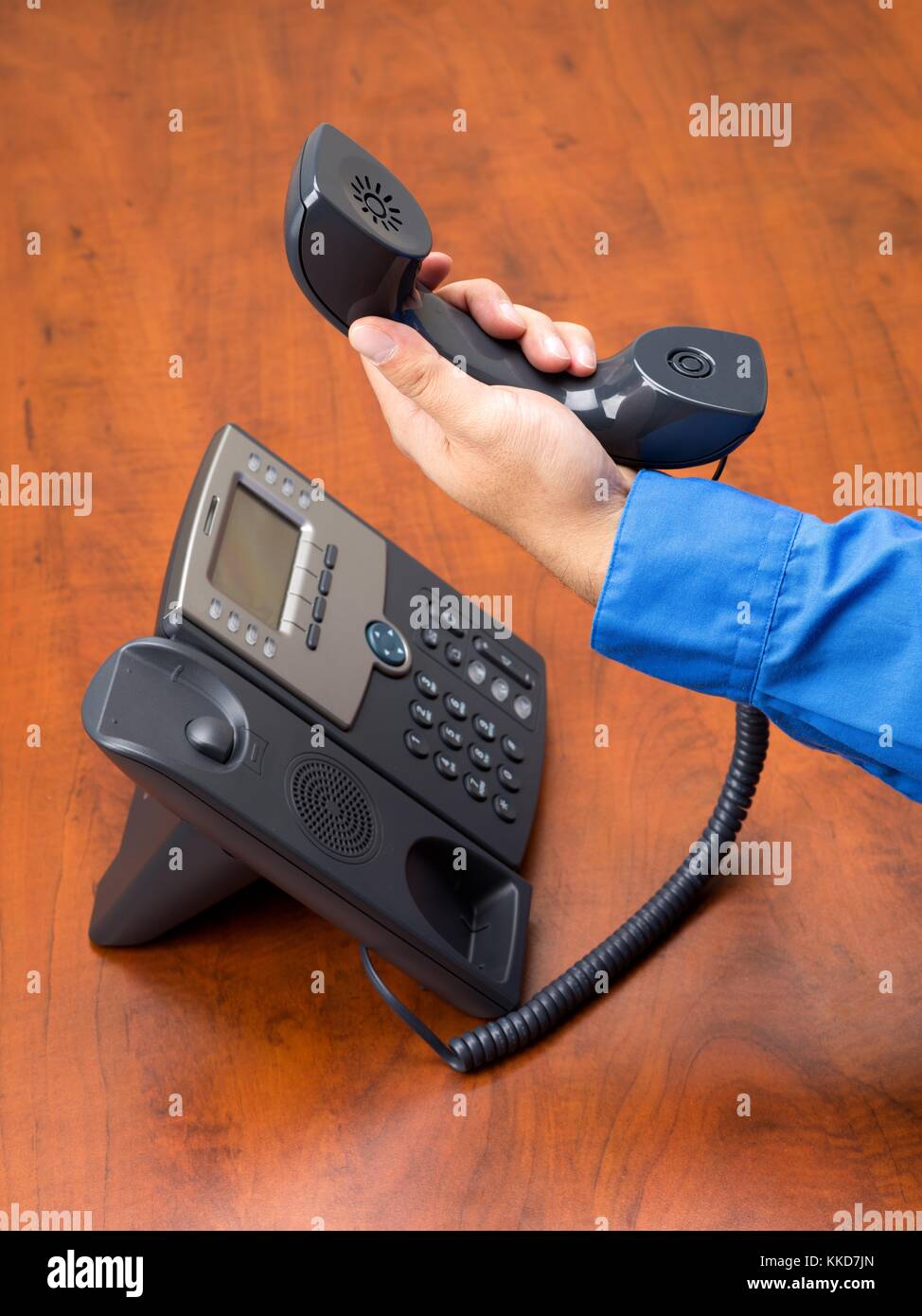 human hand holding telephone receiver Stock Photo - Alamy