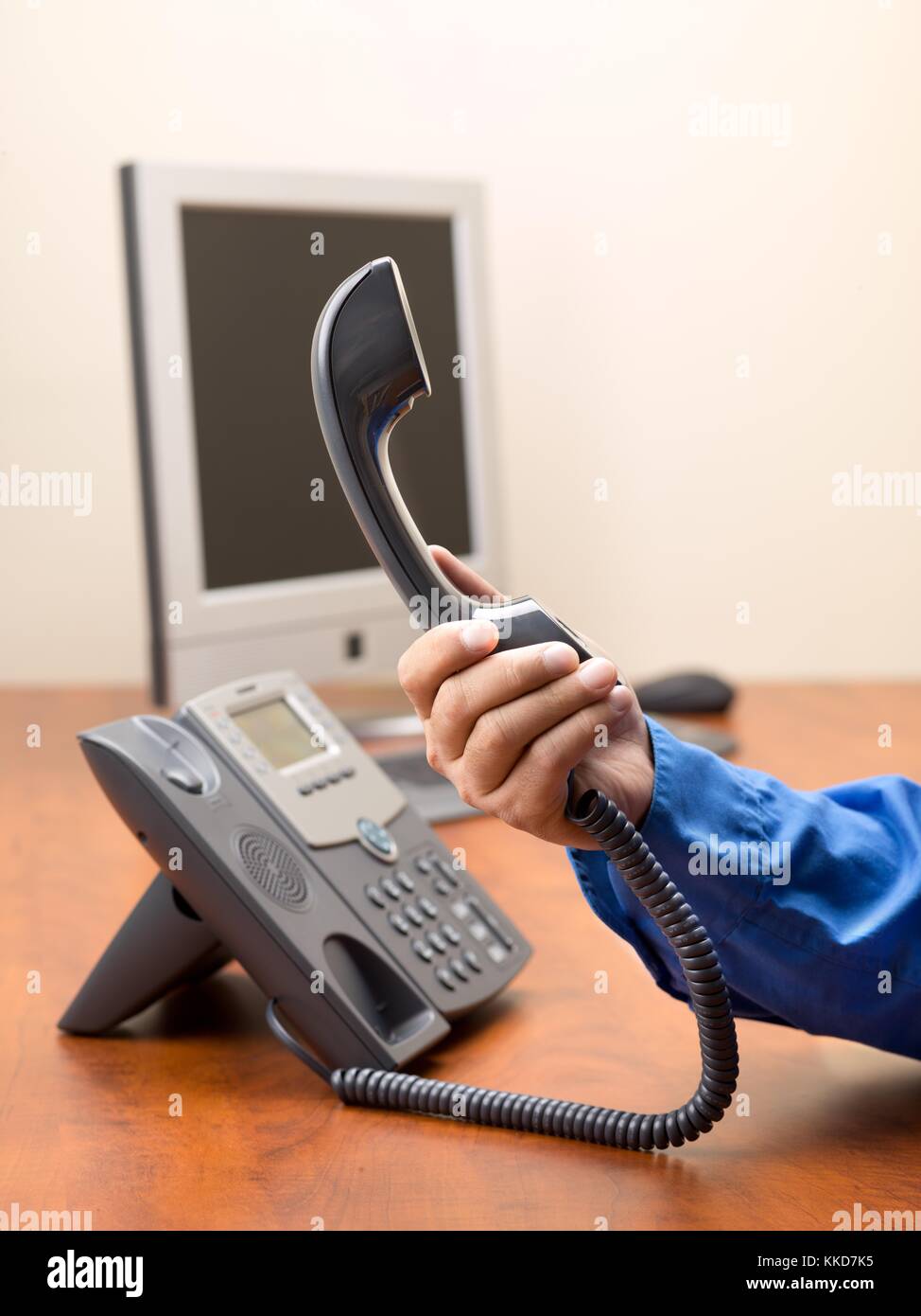 image of a hand holding telephone receiver in hand Stock Photo - Alamy