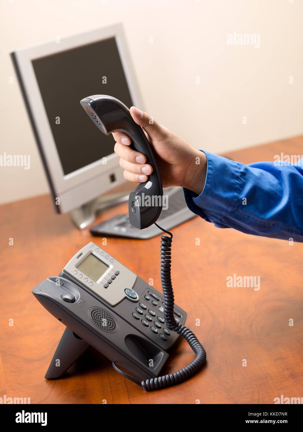 person picking up telephone receiver Stock Photo - Alamy