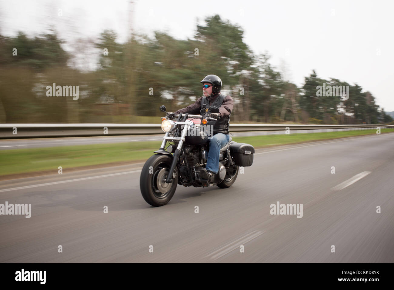 Man riding harley davidson motorcycle hi-res stock photography and ...