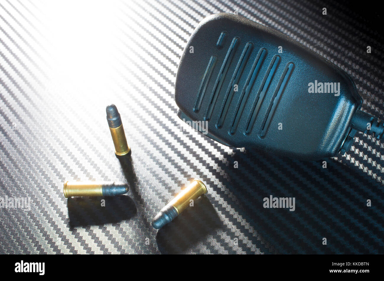 Emergency radio microphone with three rim fire bullets Stock Photo - Alamy