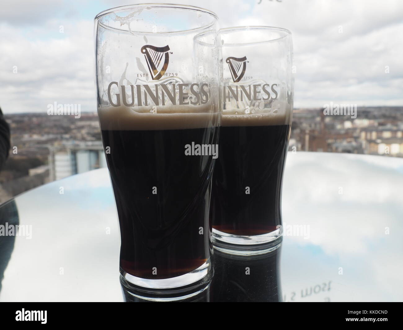 Pints of Guinness on a roof top bar Stock Photo - Alamy