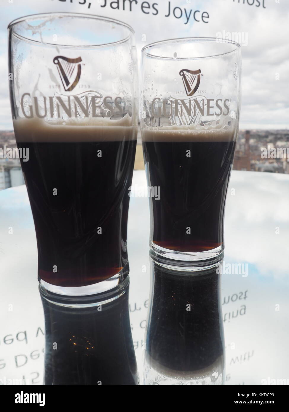 Pints of Guinness on a roof top bar Stock Photo - Alamy