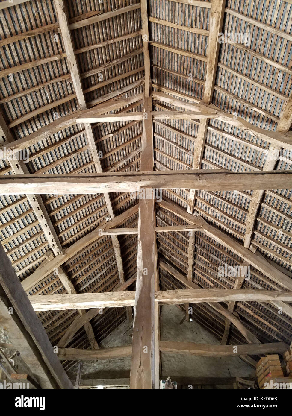 Wooden structure framework frame with beams under a roof in a farm ...