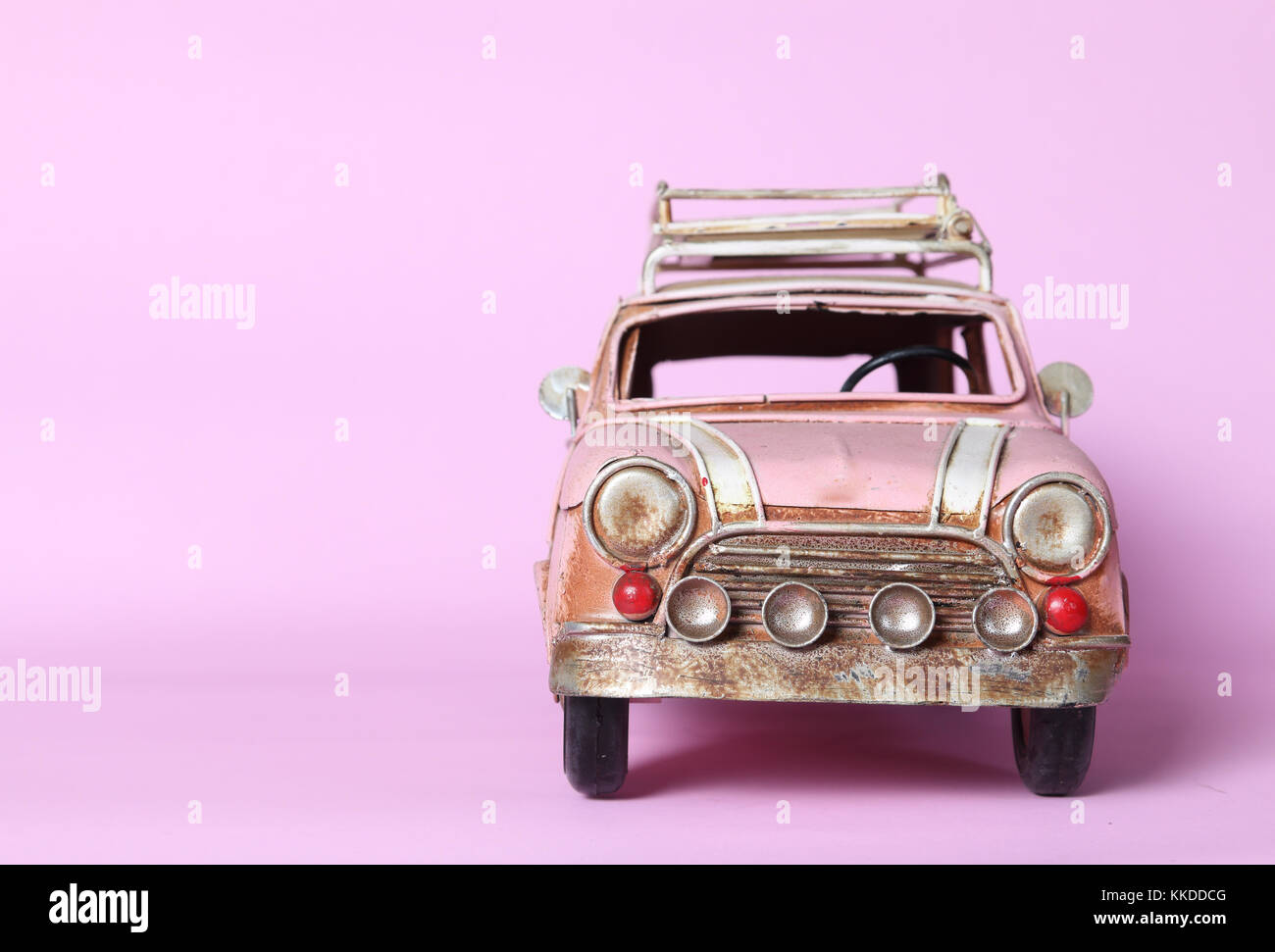 Pink miniature car on pink background, insurance concept Stock Photo ...
