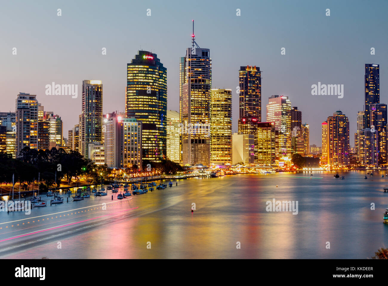 Brisbane city skyline at twilight with illuminated high-rise buildings ...