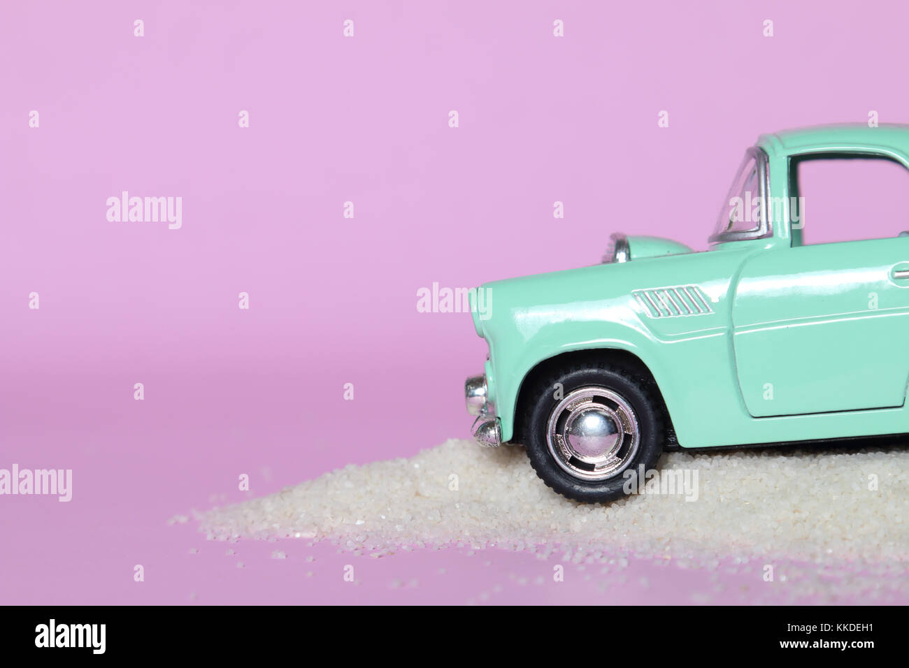 miniature car on pink background, insurance concept Stock Photo - Alamy