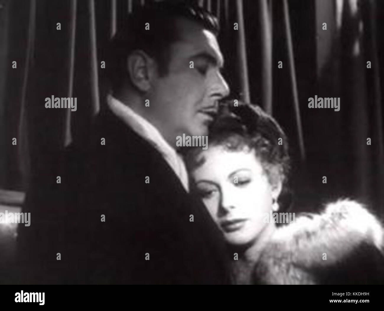 George Brent and Hedy Lamarr in Experiment Perilous trailer Stock Photo ...