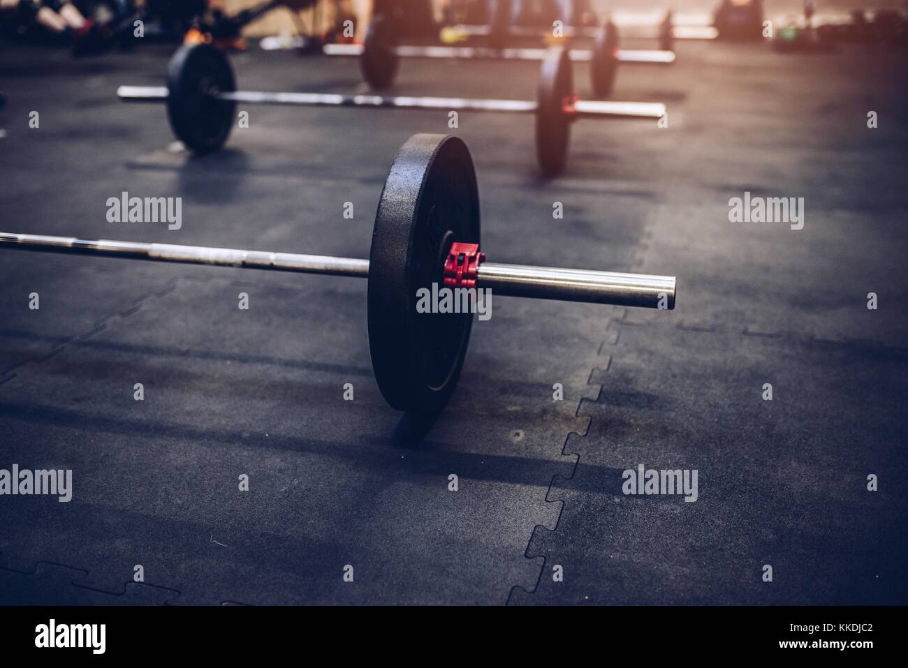 Close up on barbell on the floor in the gym Stock Photo - Alamy