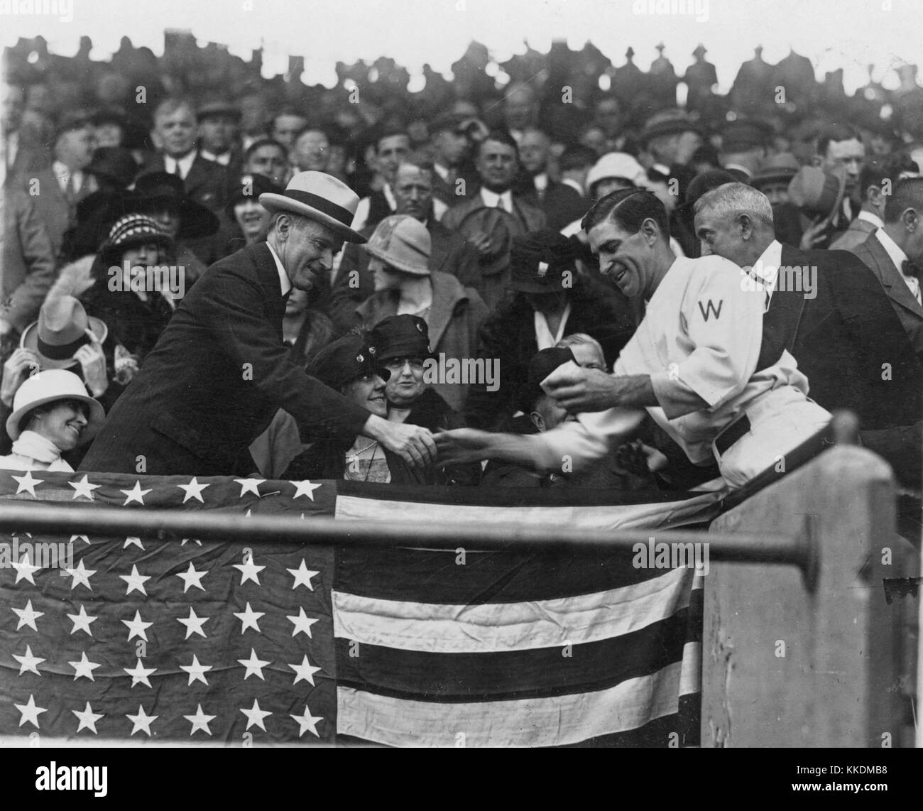 Stanley Harris gives Calvin Coolidge the baseball that opened the 1924 ...