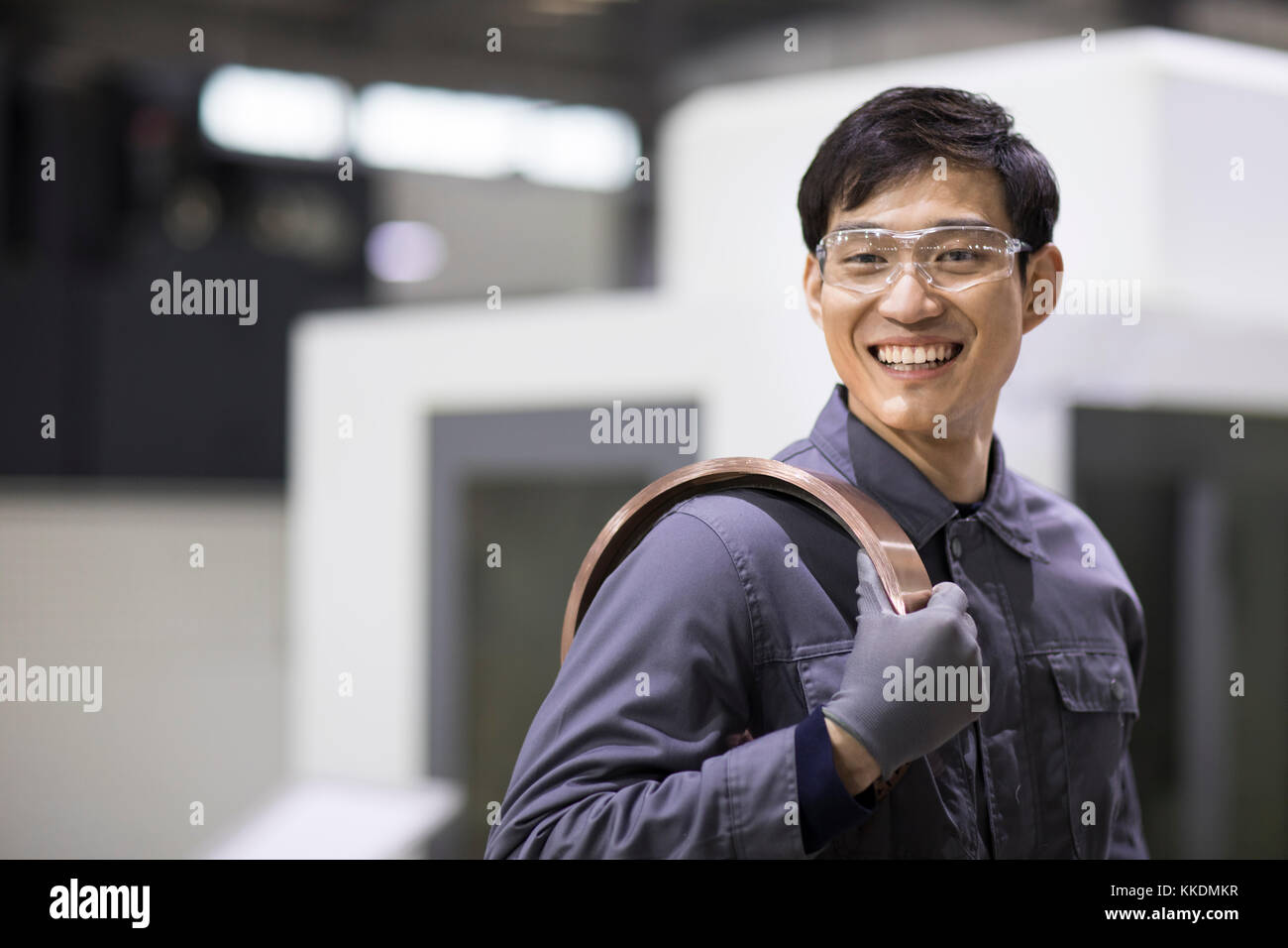 Confident Chinese engineer in the factory Stock Photo - Alamy