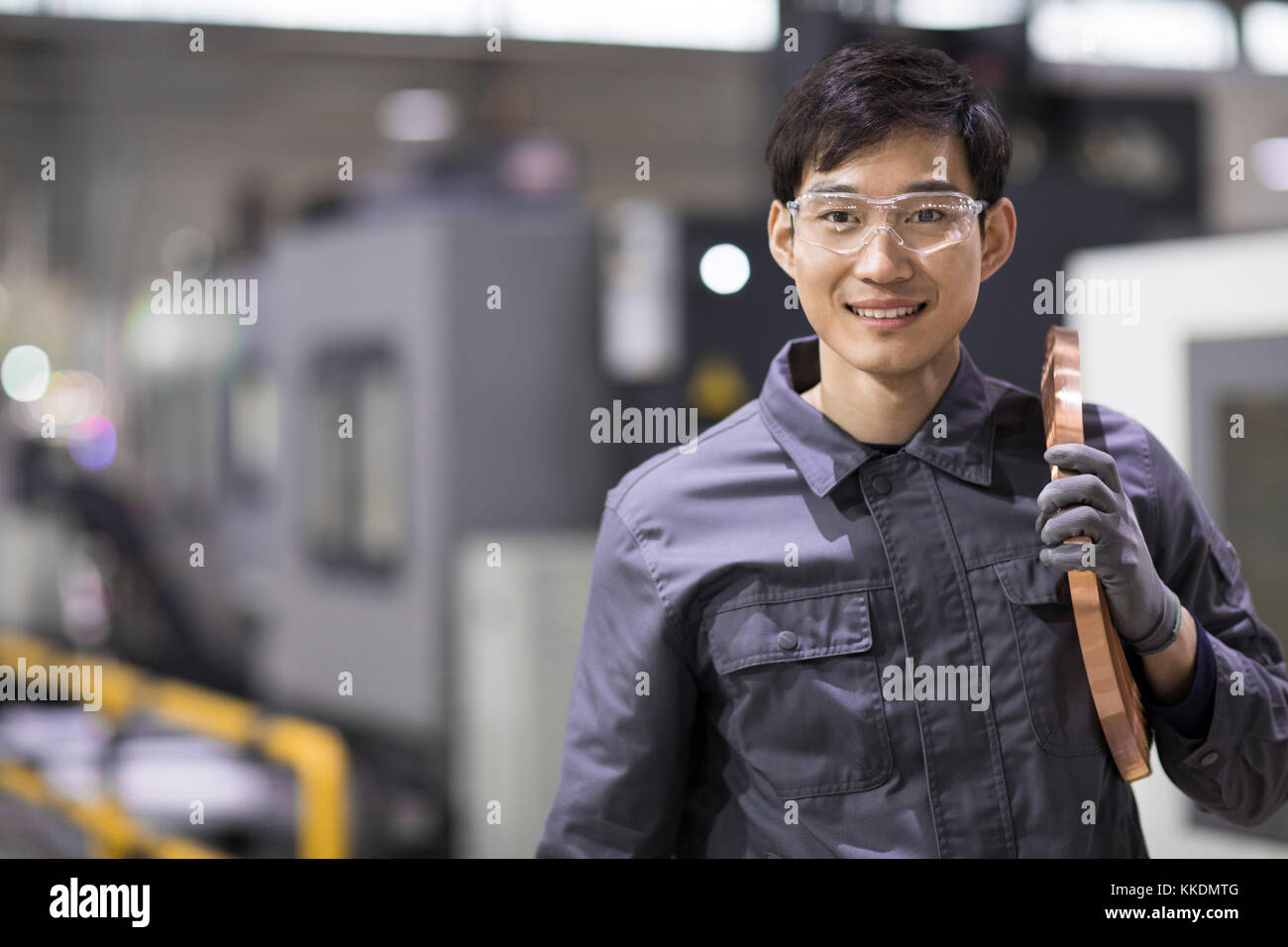 Confident Chinese engineer in the factory Stock Photo - Alamy