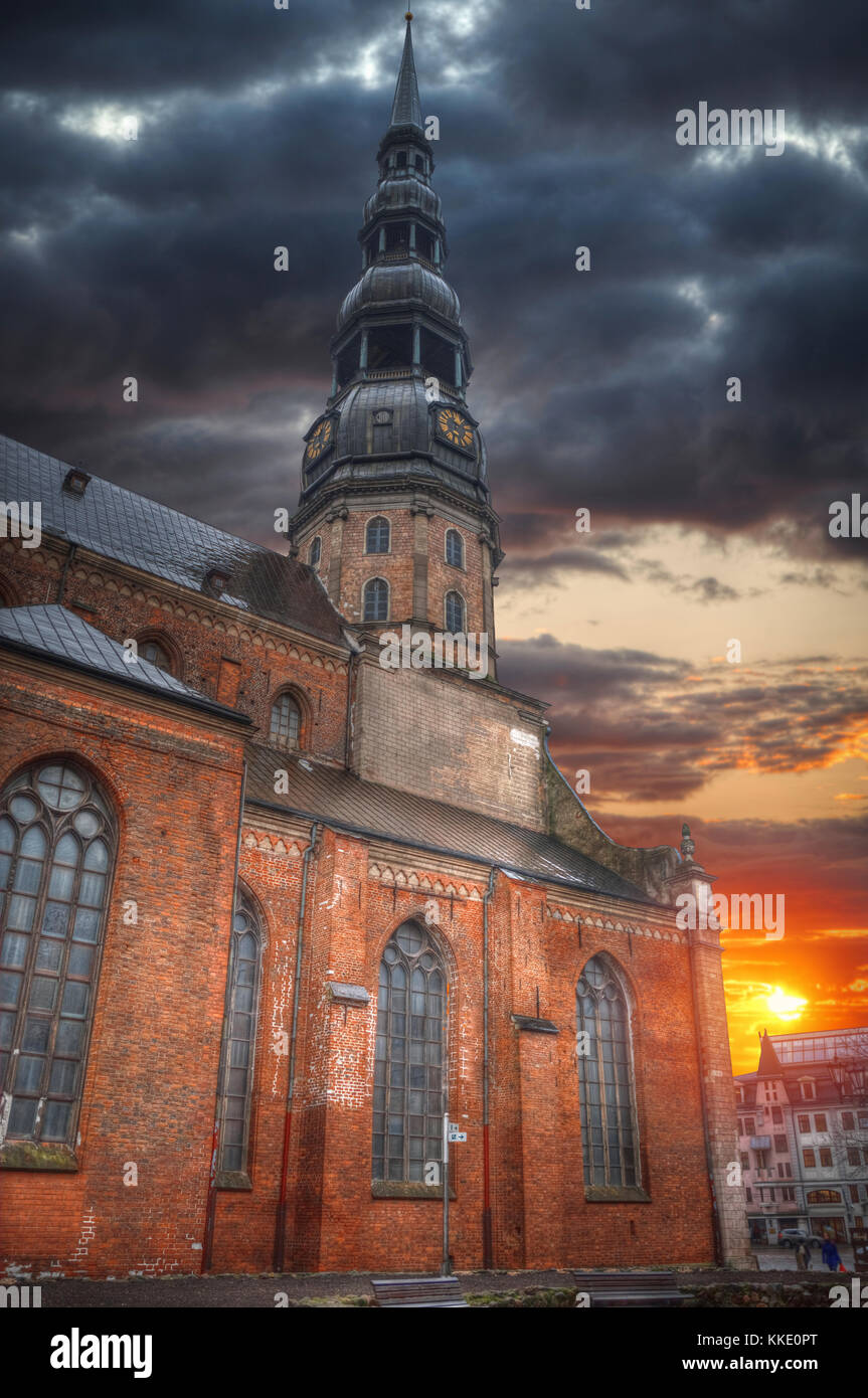 Riga Church of St. Peter and the streets of the ancient city Stock ...