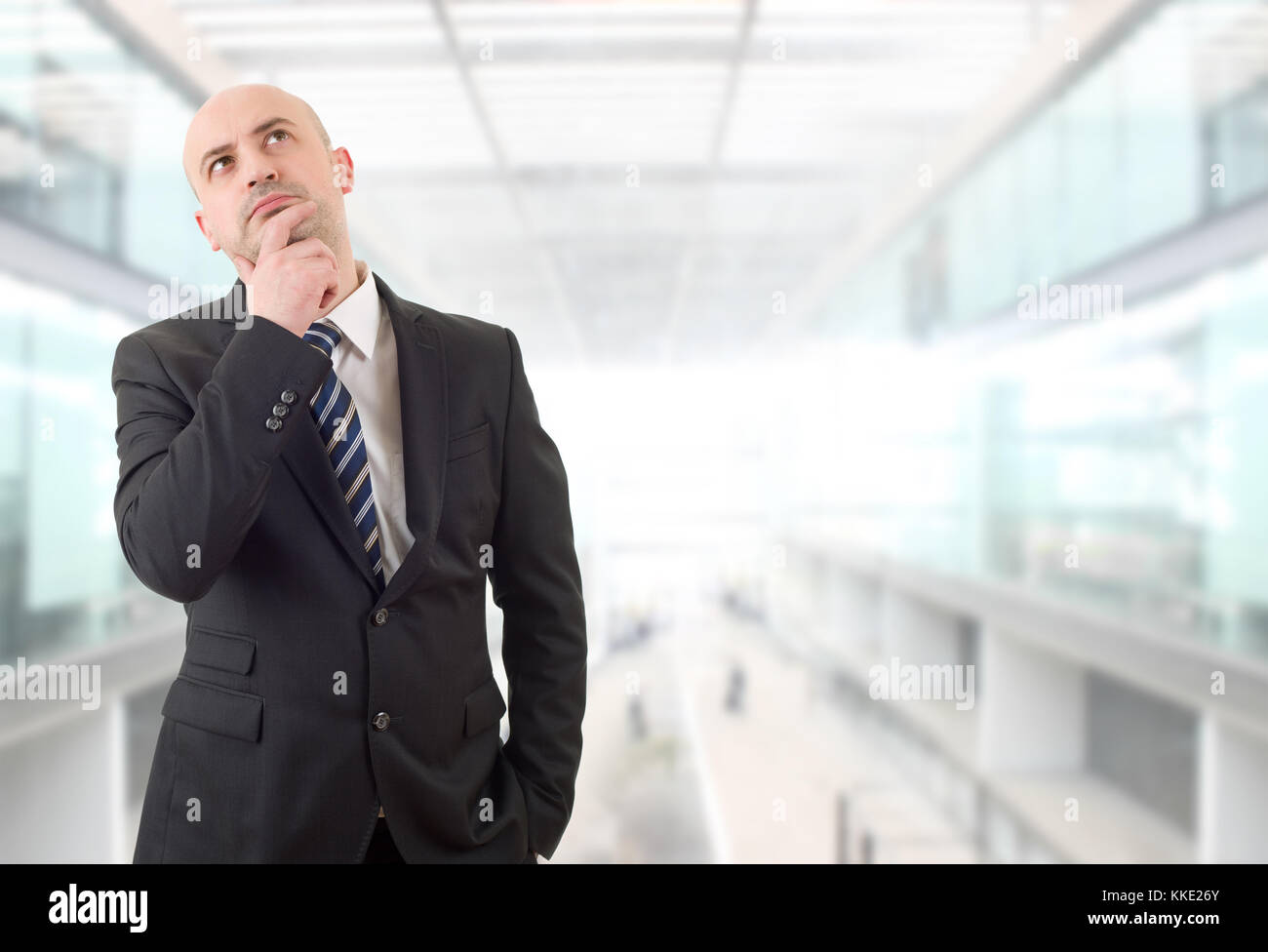 young business man thinking, at the office Stock Photo - Alamy