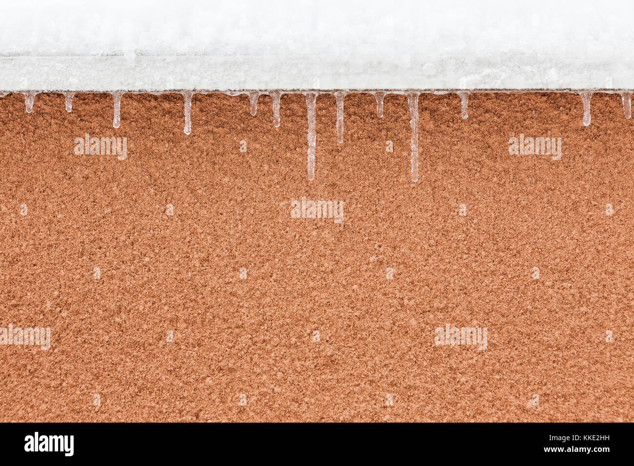 Small icicles in windowsill Stock Photo - Alamy
