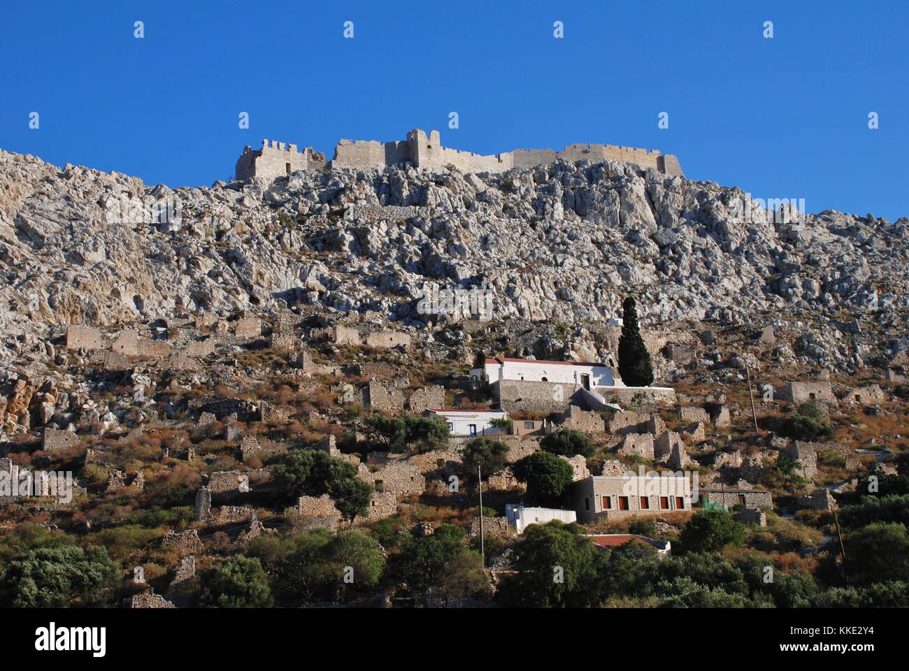 The medieval Crusader Knights castle above the mainly abandoned village ...