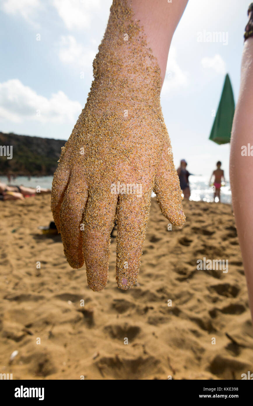 Girl with sandy hands hi-res stock photography and images - Alamy