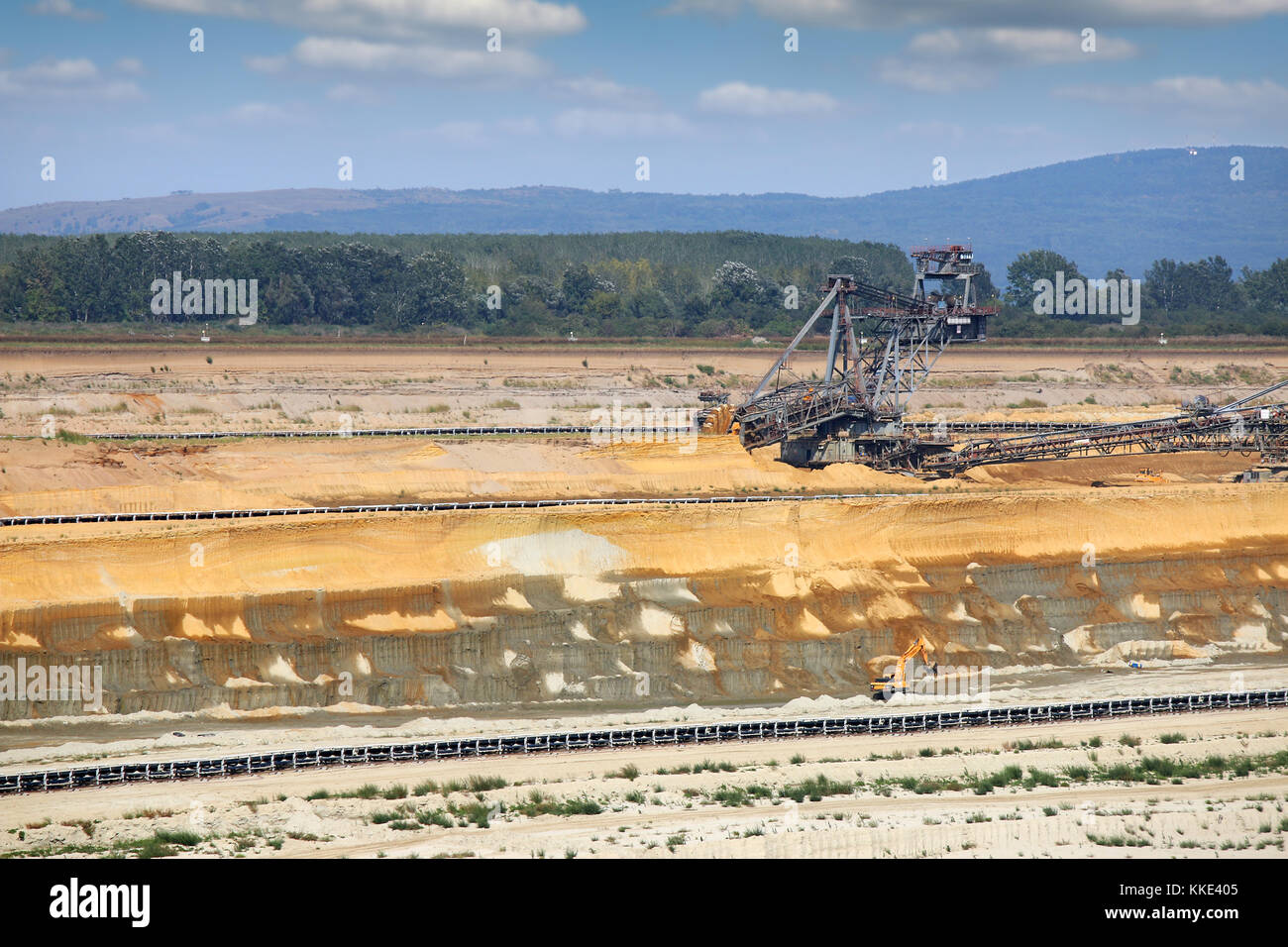 giant excavator digging mining industry Stock Photo - Alamy