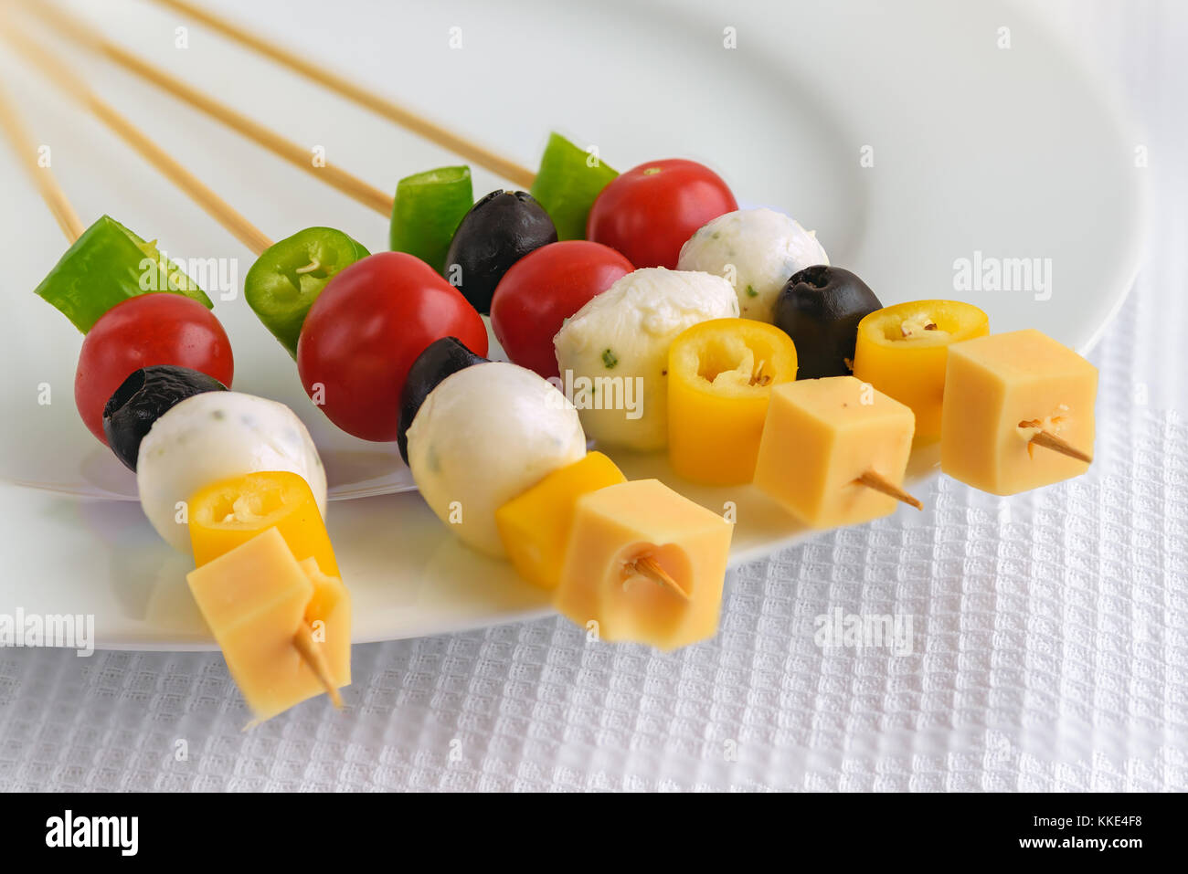 Appetizer on stick with various vegetables and cheese Stock Photo - Alamy