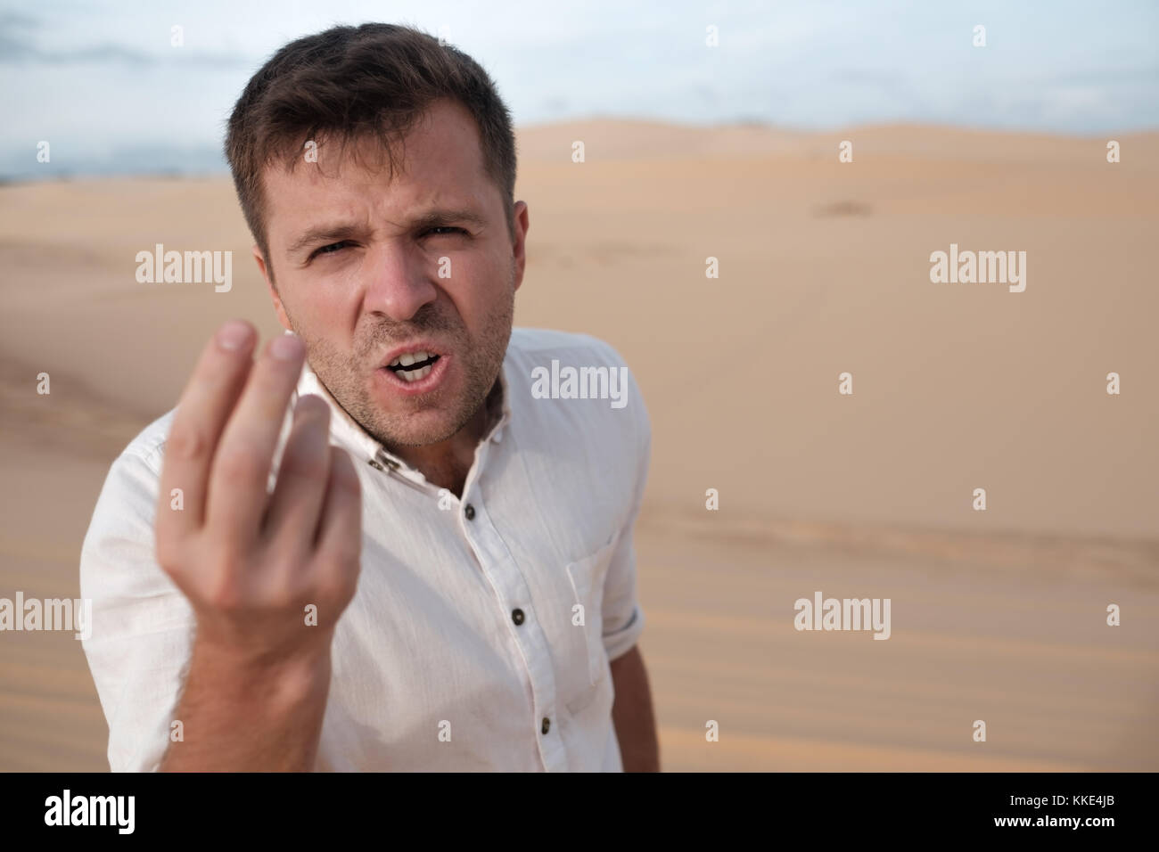 angry man shouting accusing someone standing in desert Stock Photo - Alamy angry man shouting accusing someone standing in desert Stock Photo - Alamy