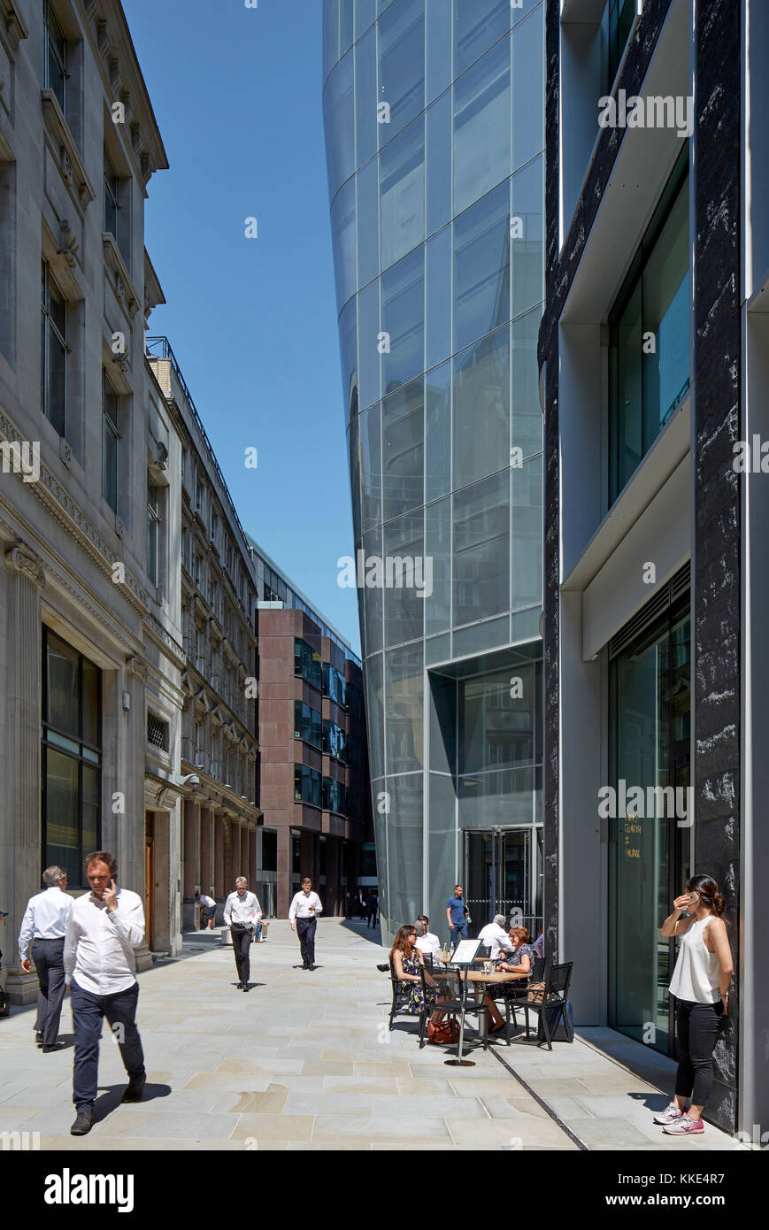 Overall entrance view with passing figures. Angel Court, London, United ...