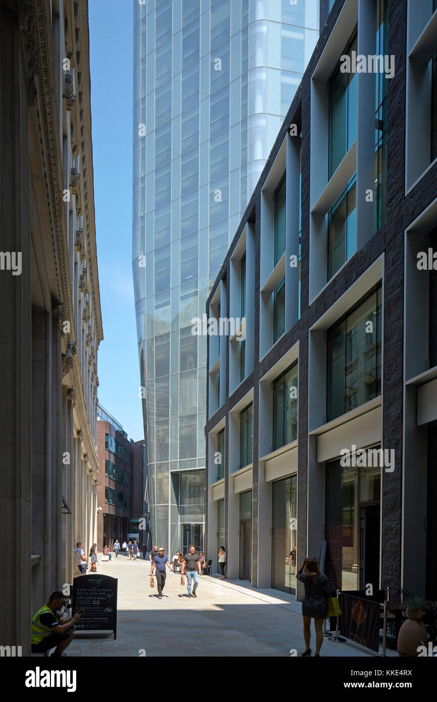 Overall entrance view with passing figures. Angel Court, London, United ...