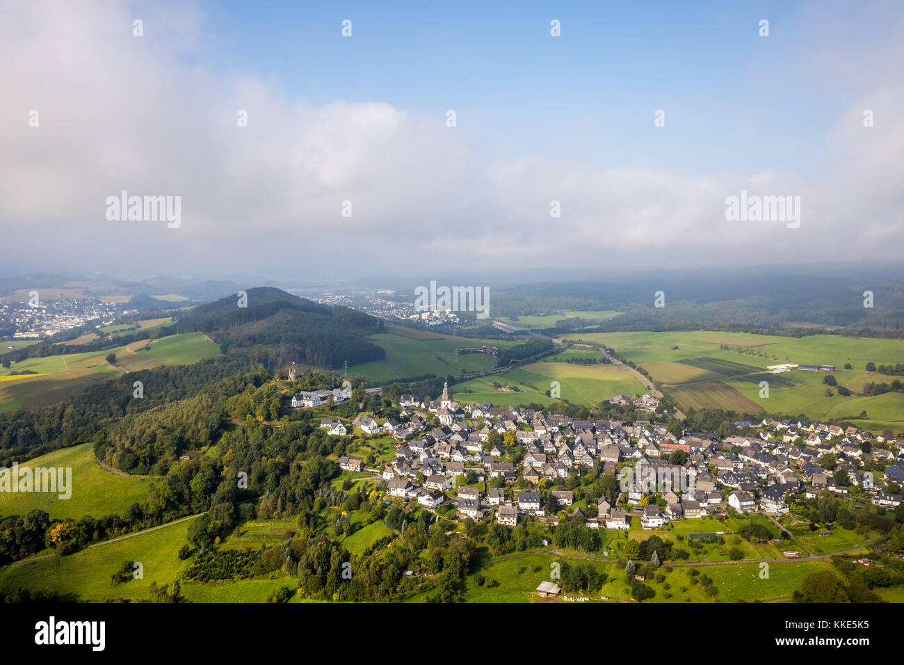 View of Eversberg with clouds, oldest half-timbered village of the ...