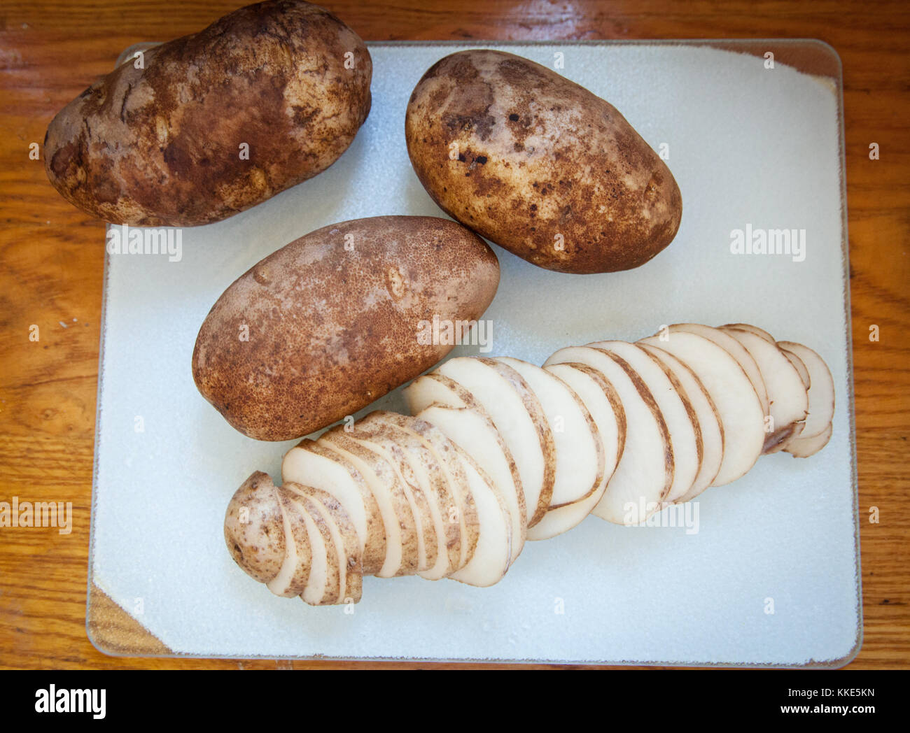 Cutting slicing potatoes hi-res stock photography and images - Alamy