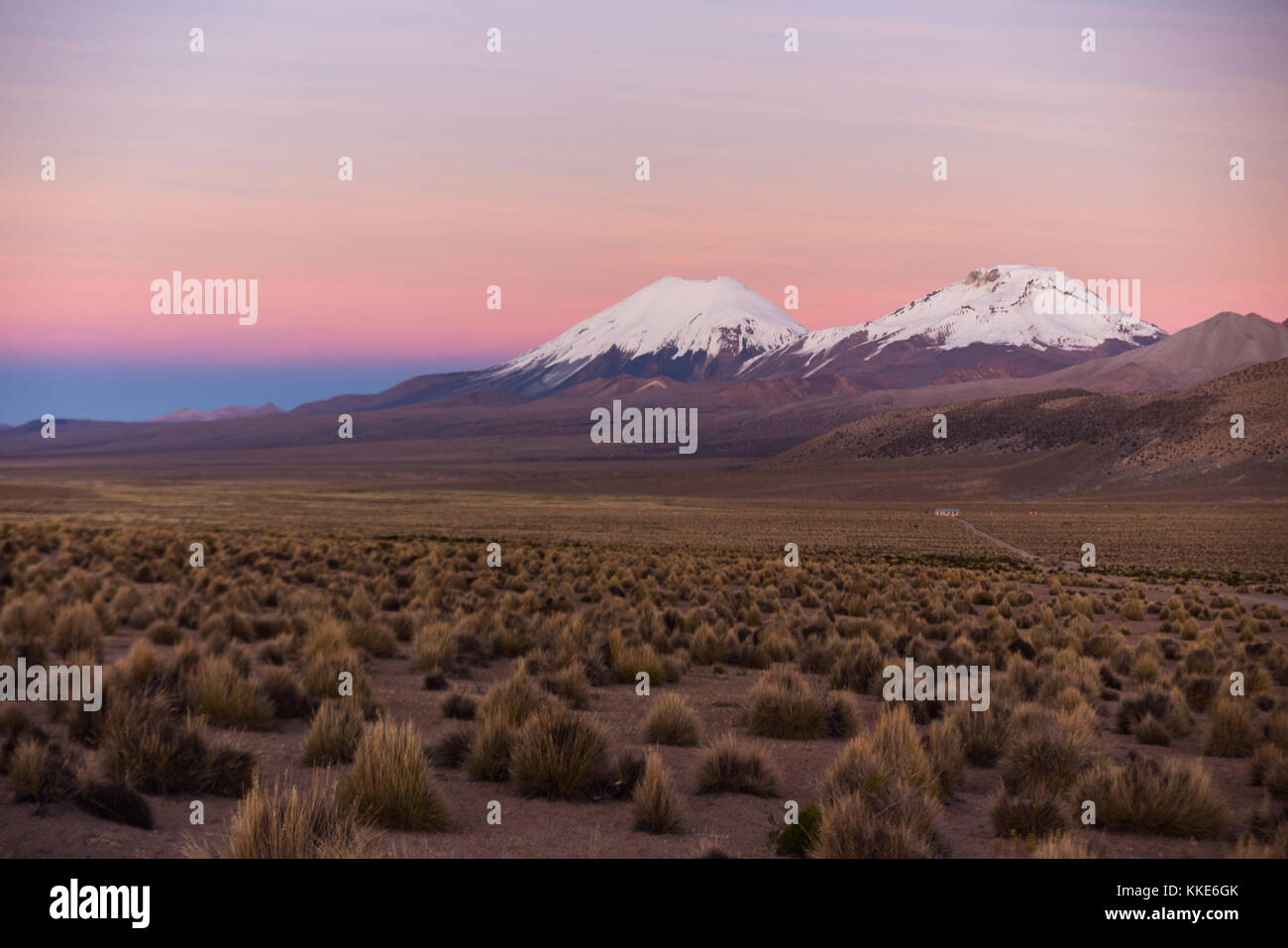Sunset in Andes. Parinacota and Pomerade volcanos. High Andean ...
